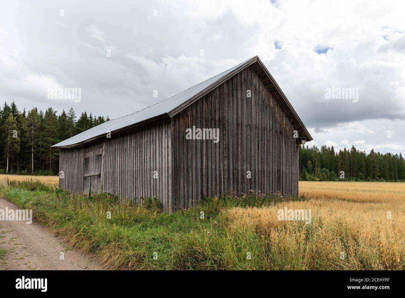Old weathered roadside barn in rural countryside of Hauho, Finland ...
