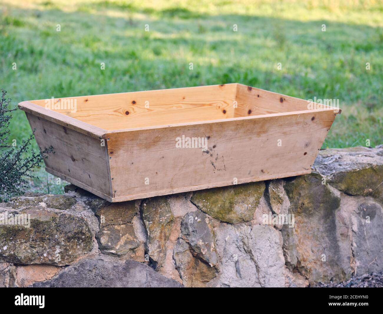 Wooden trough hi-res stock photography and images - Alamy