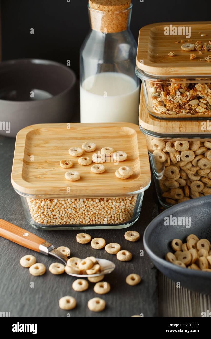 Breakfast cereal. Glass boxes with granola, cereal rings and Quinoa ...