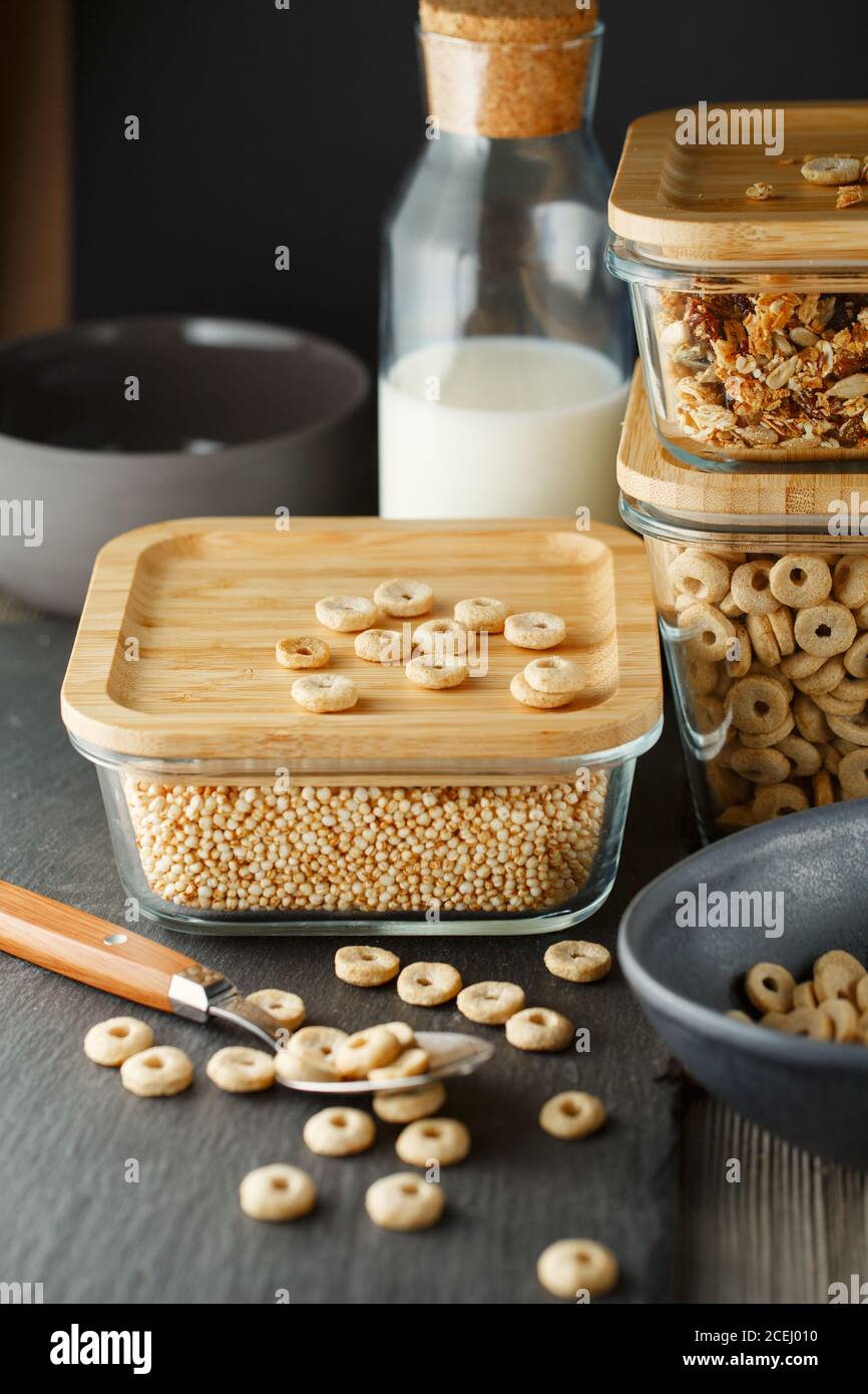 Breakfast cereal. Glass boxes with granola, cereal rings and Quinoa ...