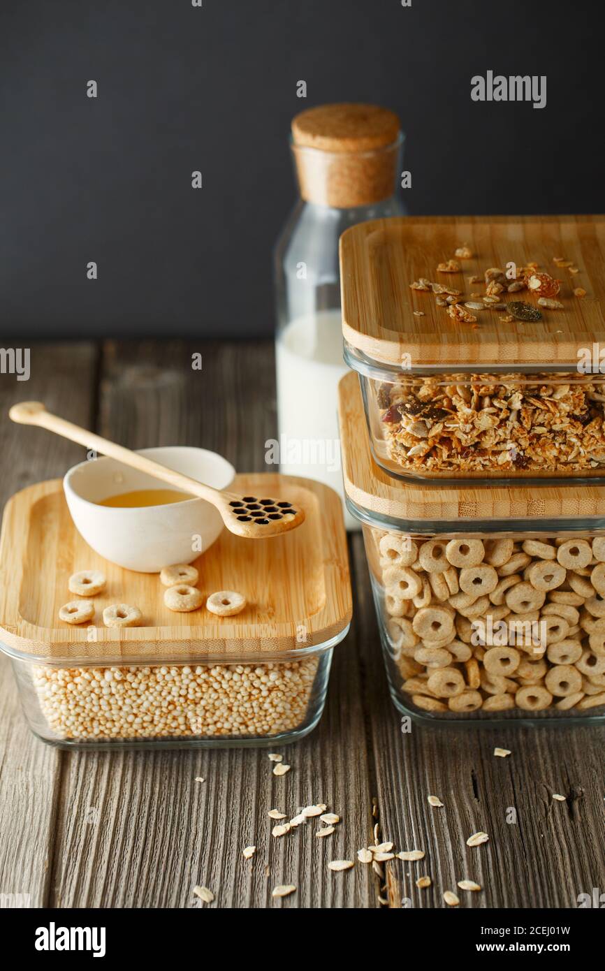 Breakfast cereal. Glass boxes with granola, cereal rings and Quinoa ...
