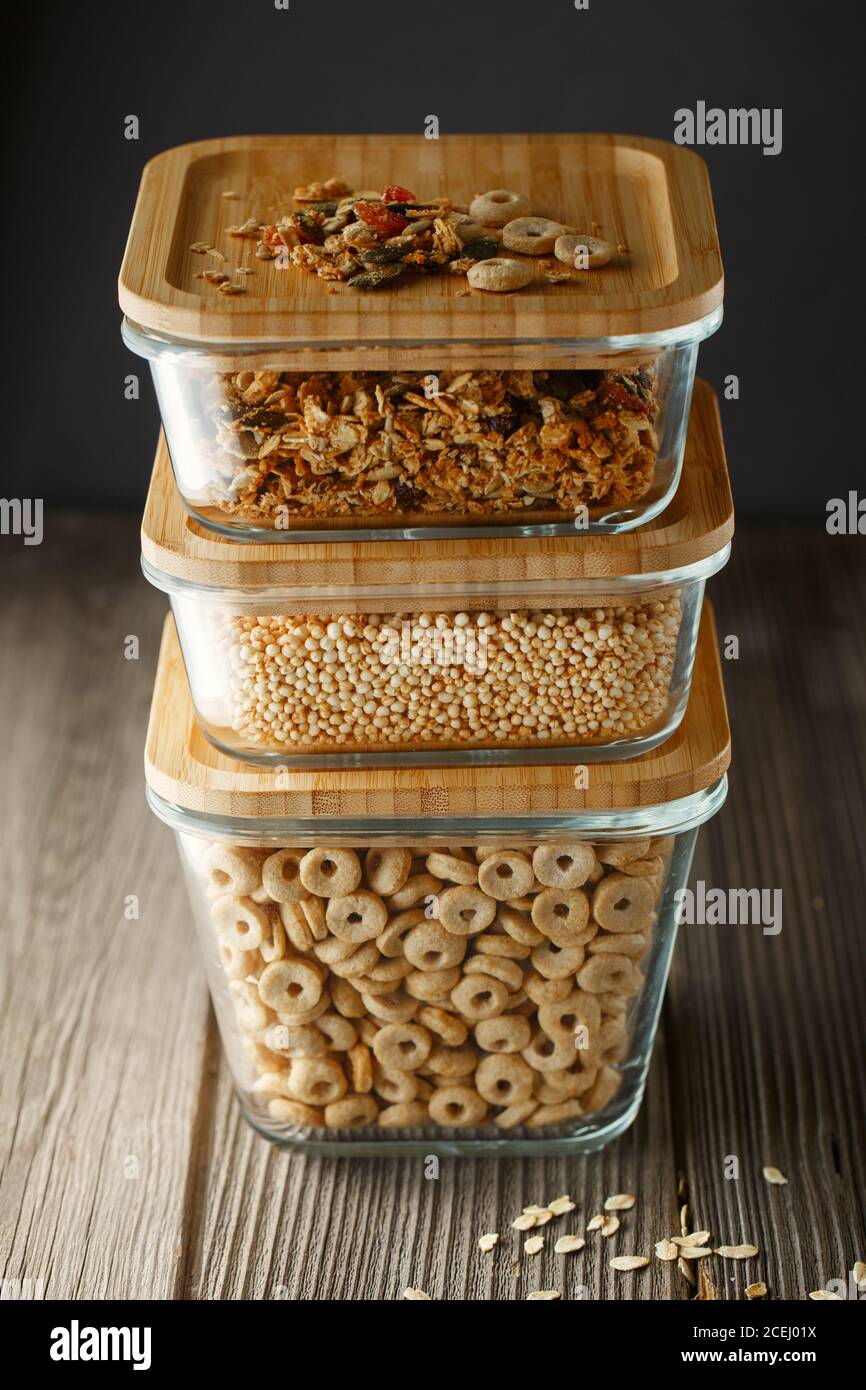 Breakfast cereal. Glass boxes with granola, cereal rings and Quinoa ...
