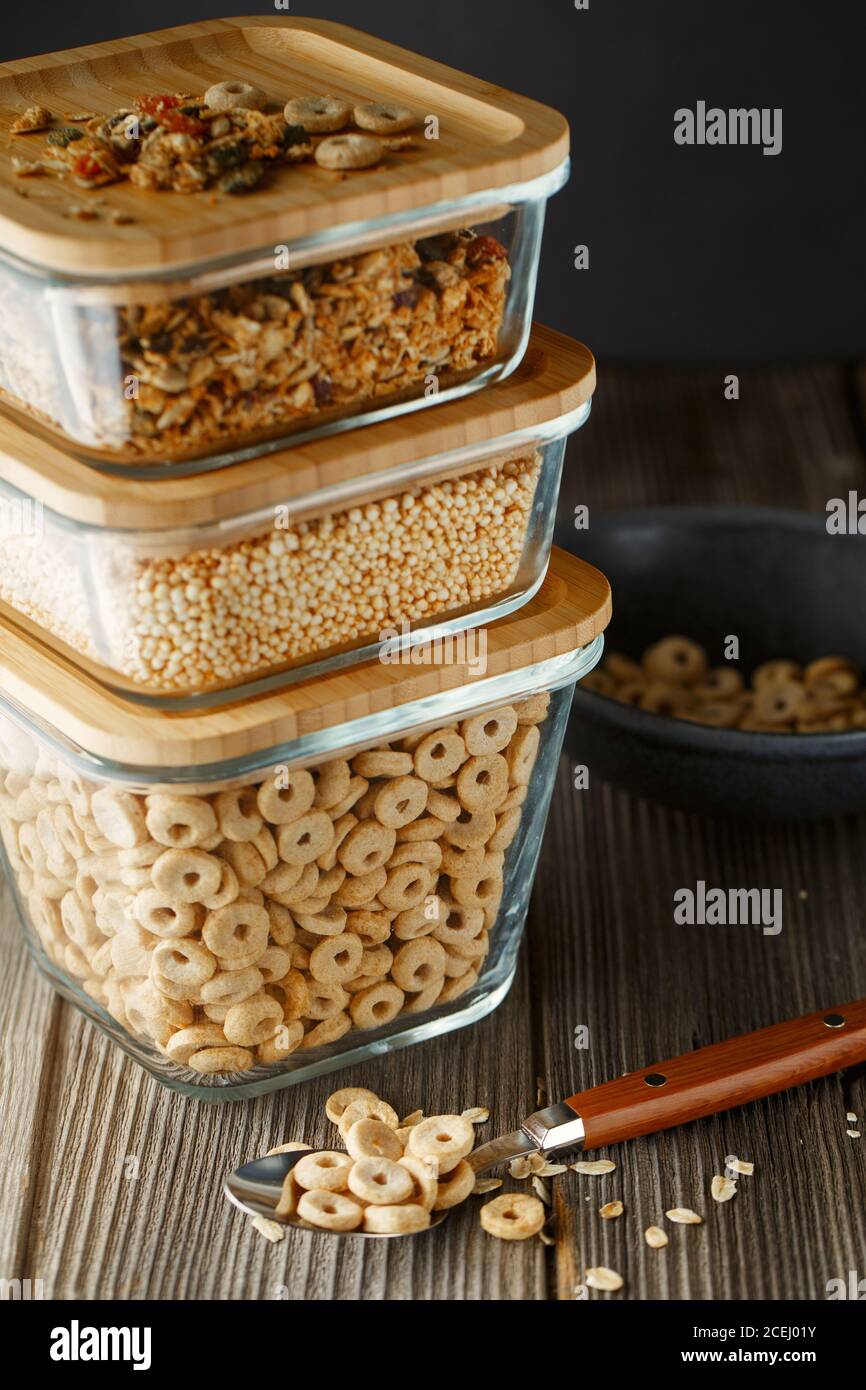Breakfast cereal. Glass boxes with granola, cereal rings and Quinoa ...