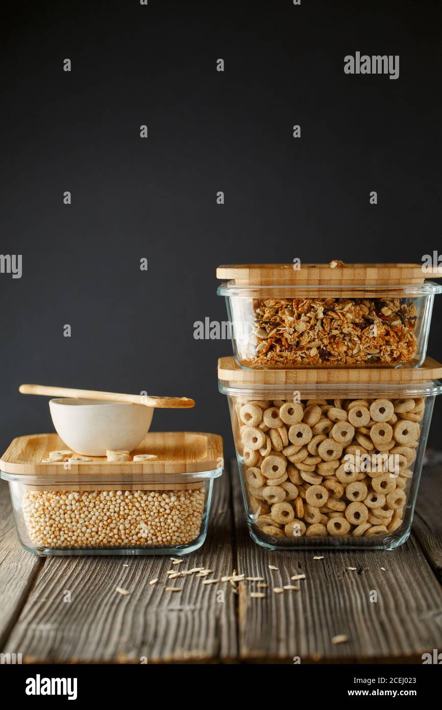 Breakfast cereal. Glass boxes with granola, cereal rings and Quinoa ...