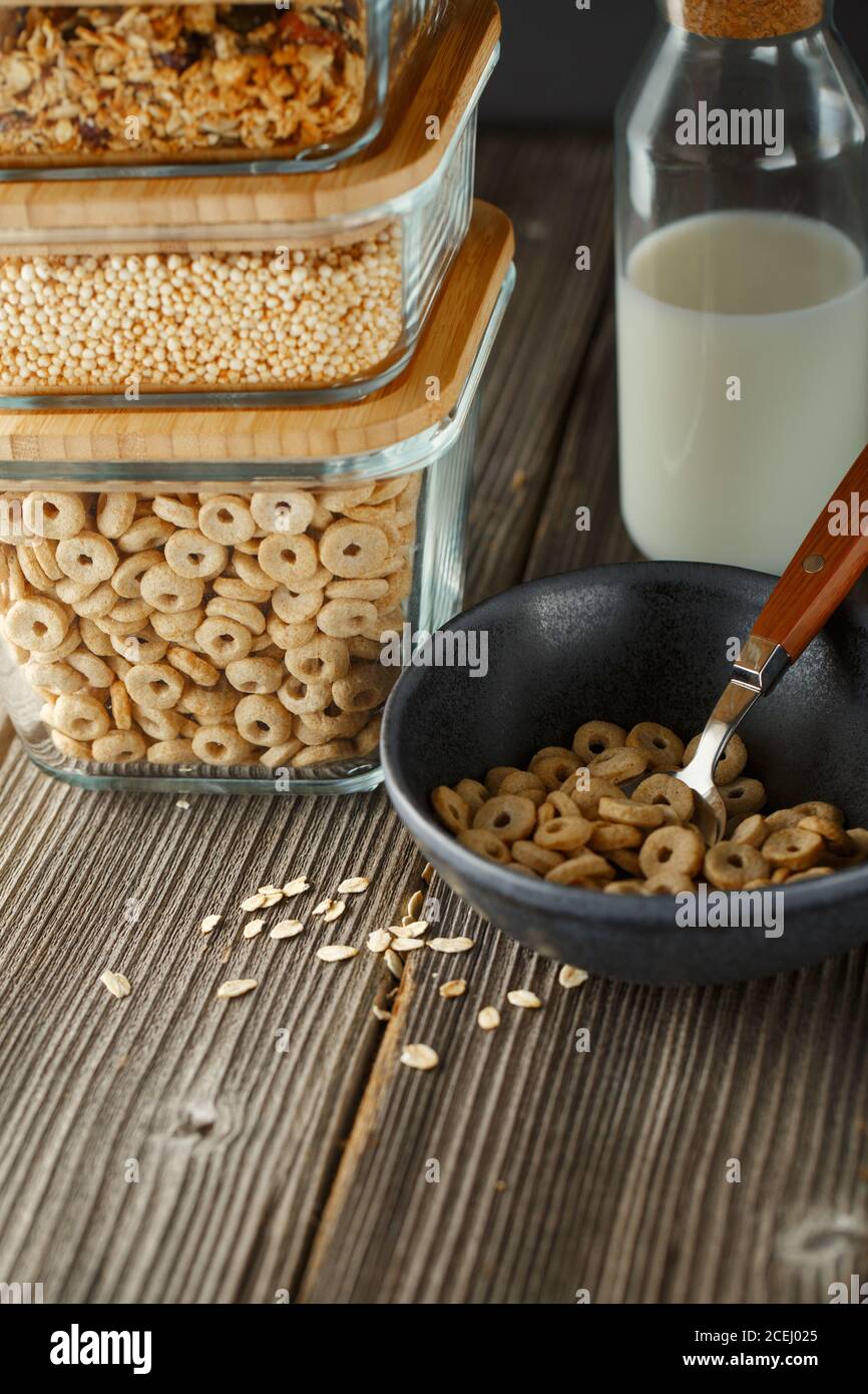 Breakfast cereal. Glass boxes with granola, cereal rings and Quinoa ...