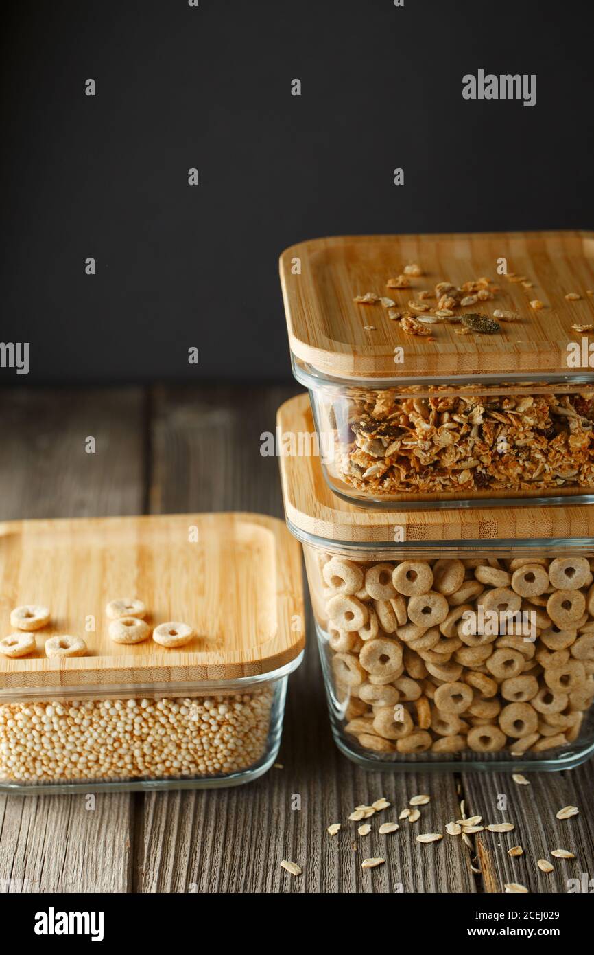 Breakfast cereal. Glass boxes with granola, cereal rings and Quinoa ...