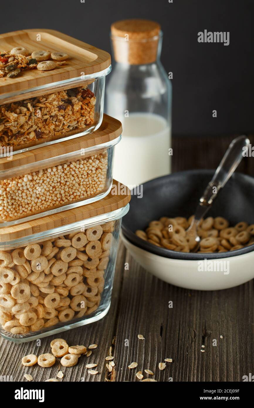 Breakfast cereal. Glass boxes with granola, cereal rings and Quinoa ...
