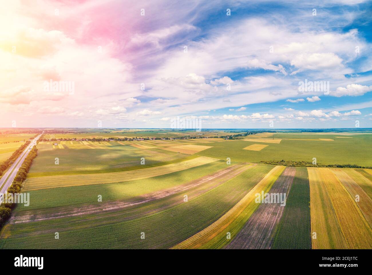 Rural landscape with a beautiful sky. Aerial view. View of colorful ...