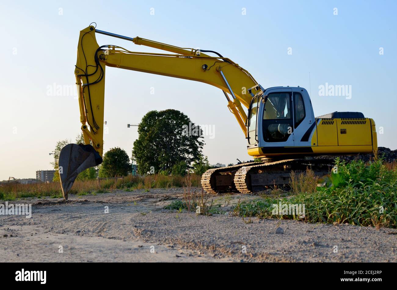 Hydraulic excavator installing pipeline hi-res stock photography and ...