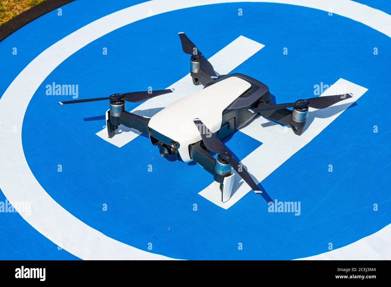 UAV White drone Quadr copter in flight with geodesic module and digital ...