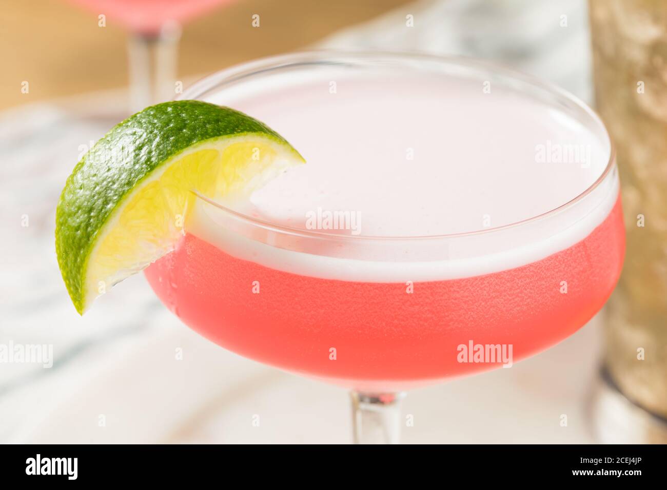 Refreshing Cold Pink Cosmopolitan Cocktail with Vodka and Cranberry ...