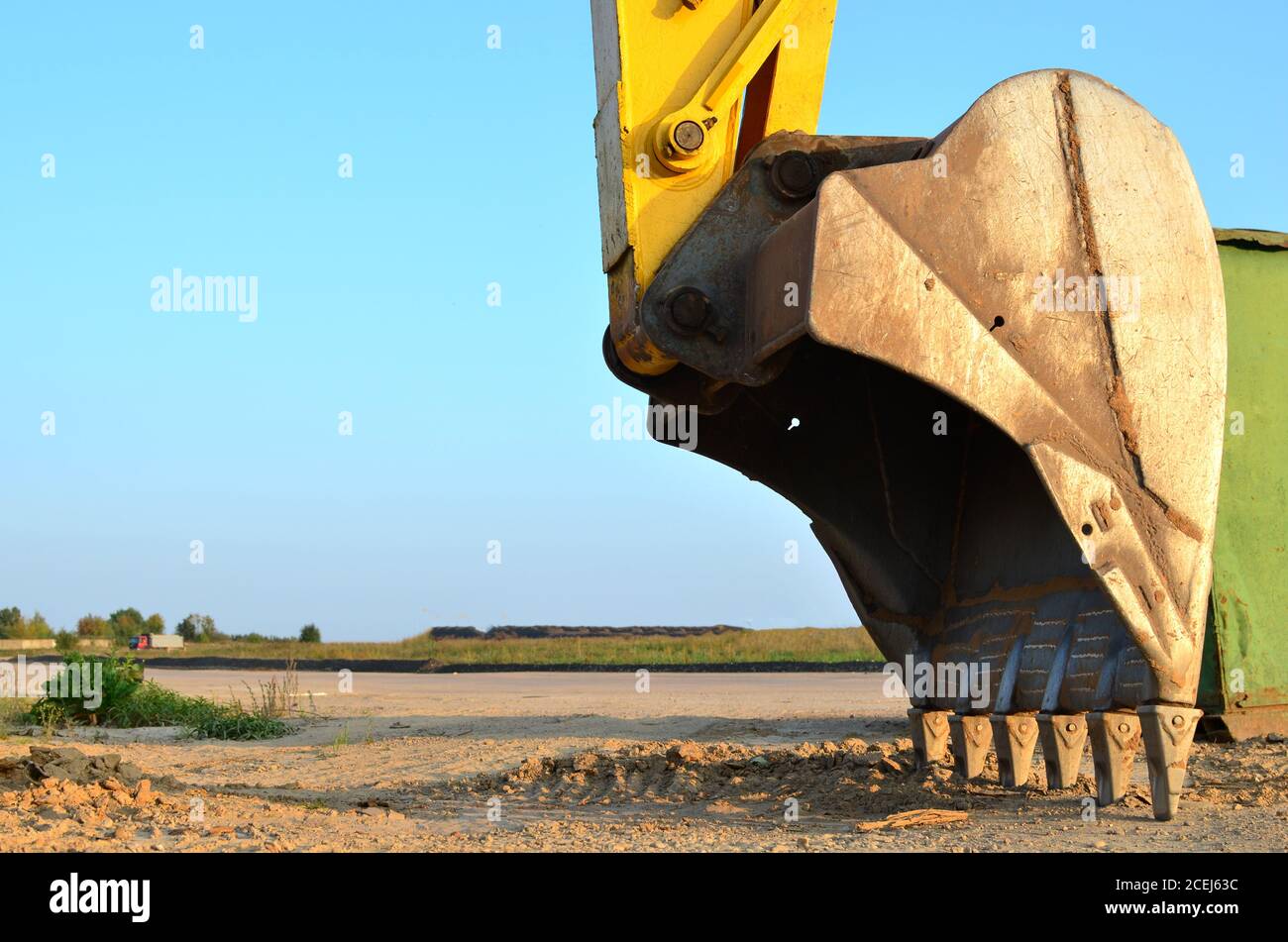 Large metal iron ladle. Excavator bucket for digging a pit and pipeline ...