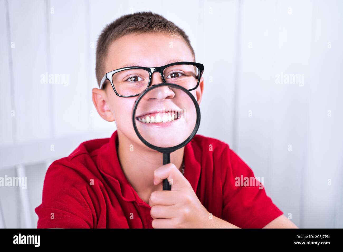 Little school boy express positive and negative emotions through a ...