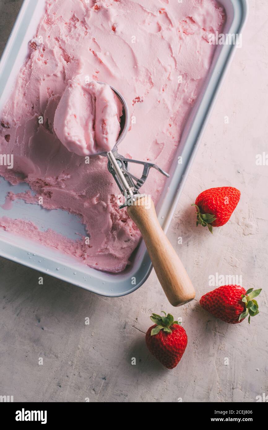 Delicious strawberry ice cream in set Stock Photo - Alamy