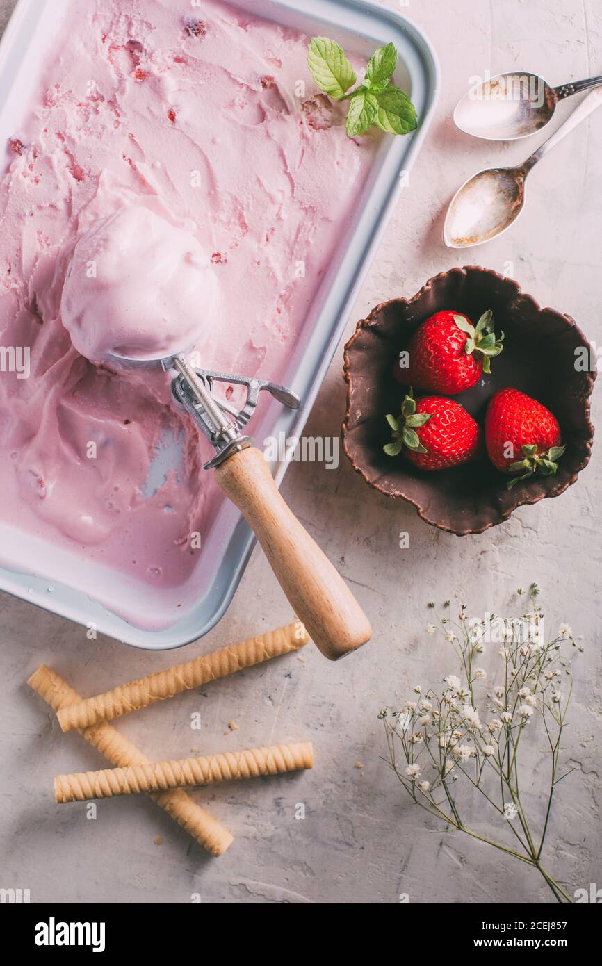 Delicious strawberry ice cream in set Stock Photo - Alamy