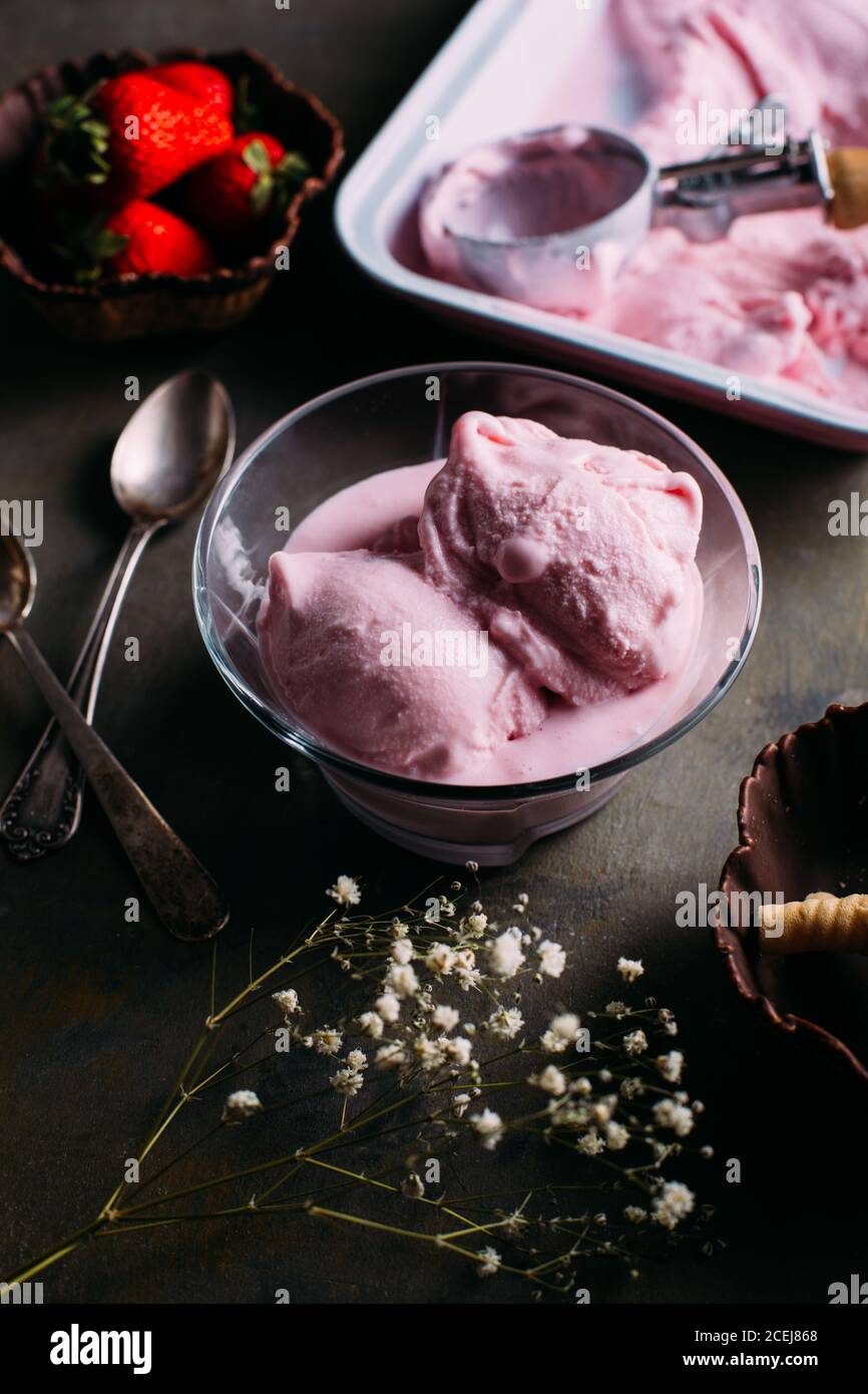 Delicious strawberry ice cream in set Stock Photo - Alamy