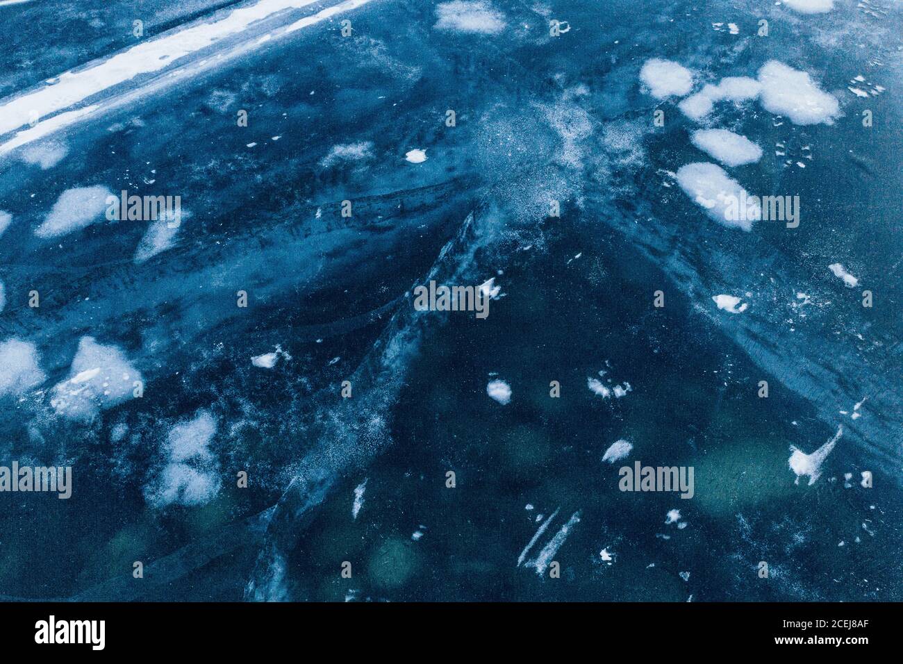 Blue ice texture. Abstract arctic winter background. Winter ice along ...
