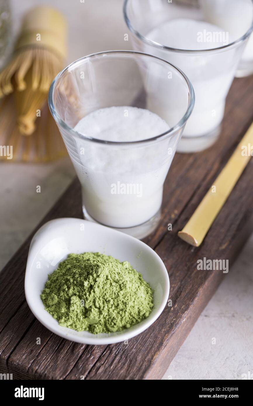 Preparing matcha latte beverage Stock Photo - Alamy