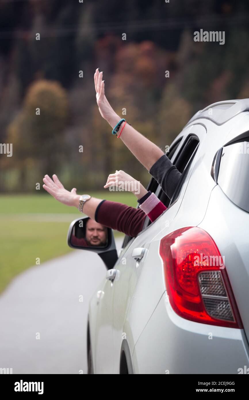 Girls hand out car window hi-res stock photography and images - Alamy