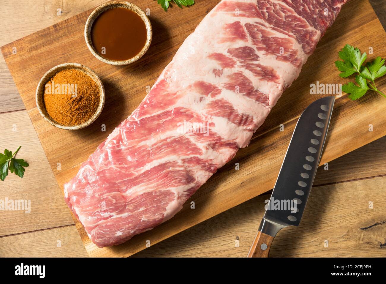 Raw St Louis Style BBQ Ribs with Rub Ready to Cook Stock Photo - Alamy