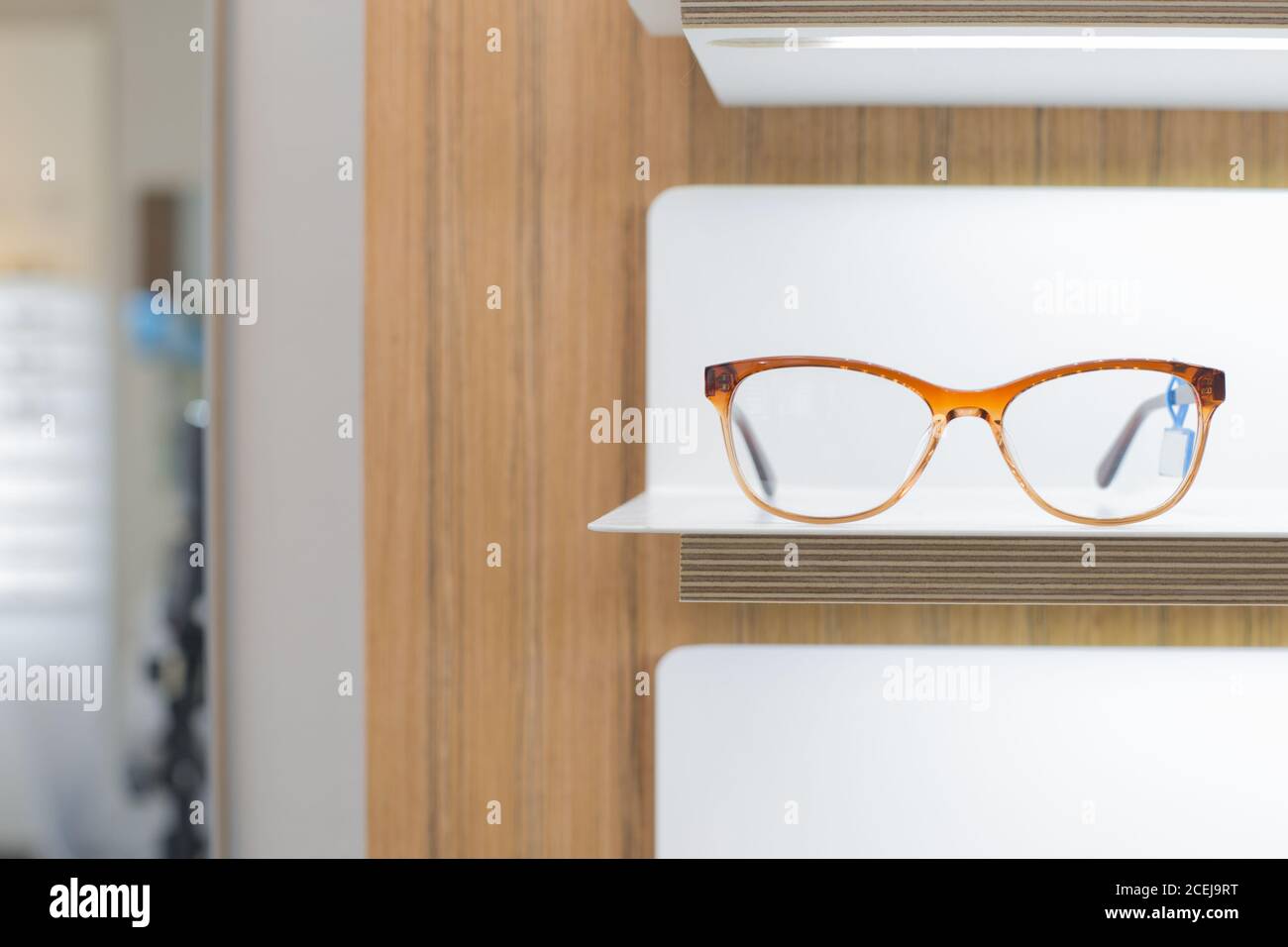 glasses on a shelf in a store Stock Photo - Alamy