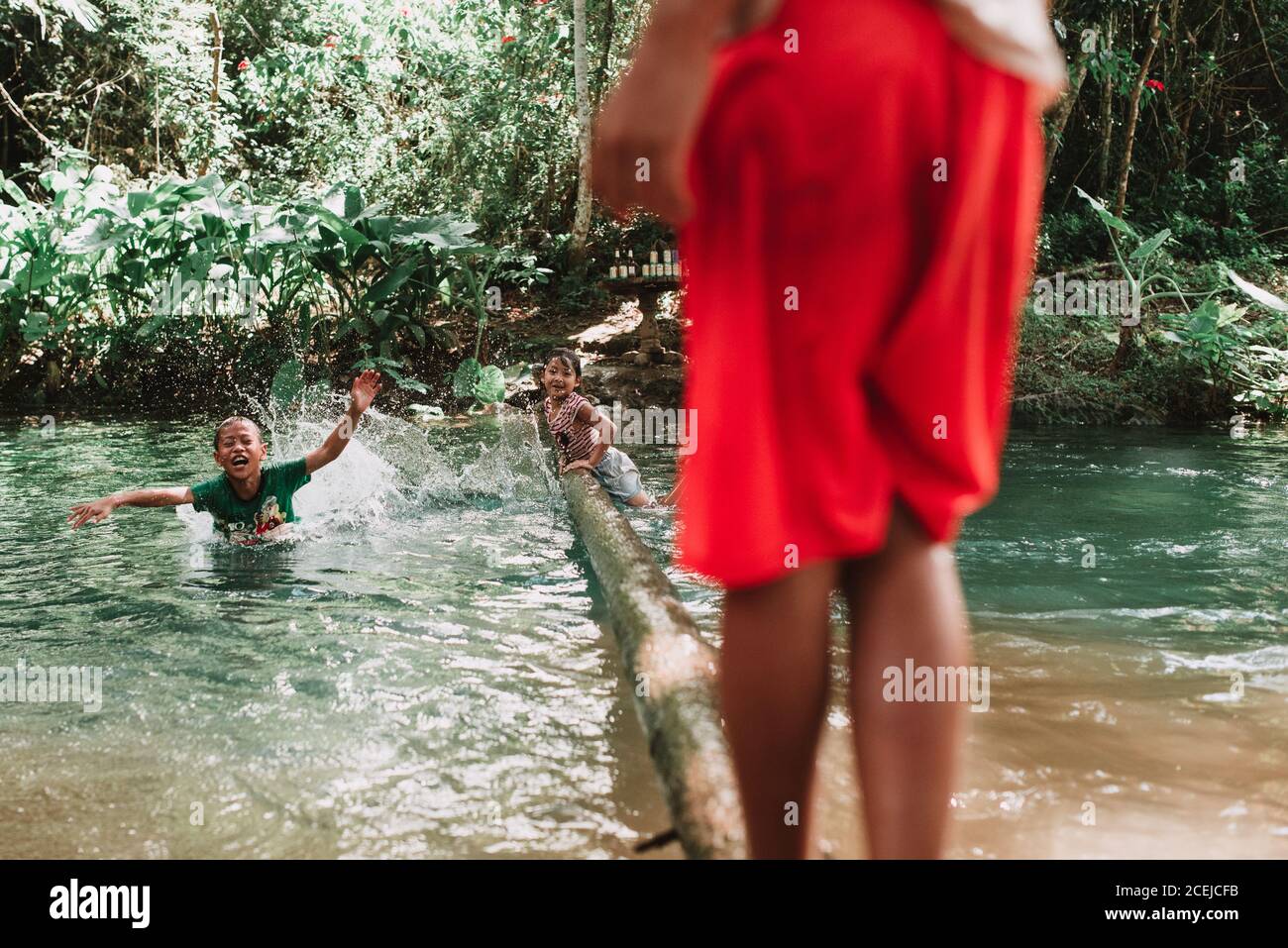 Crop wet child at lake Stock Photo - Alamy