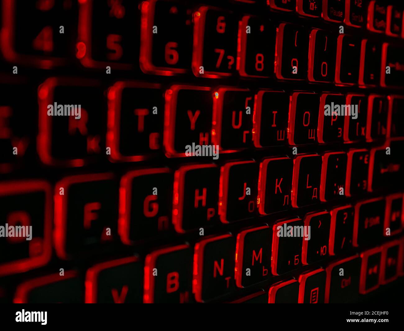 Black computer keyboard with red backlight in the dark Stock Photo - Alamy