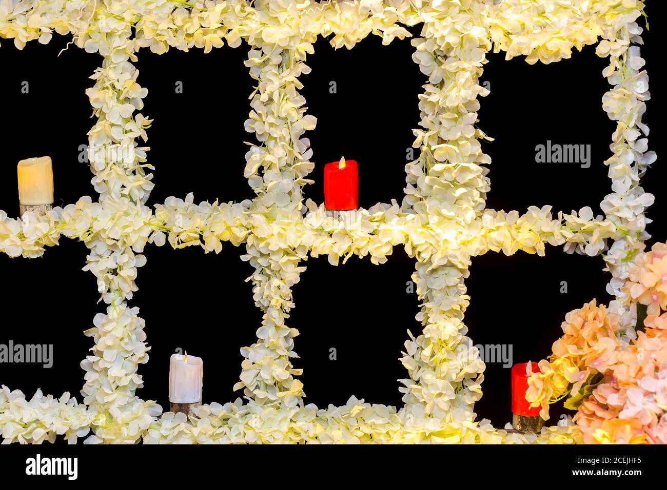 Wedding stage with artificial candles and flowers decoration Stock ...