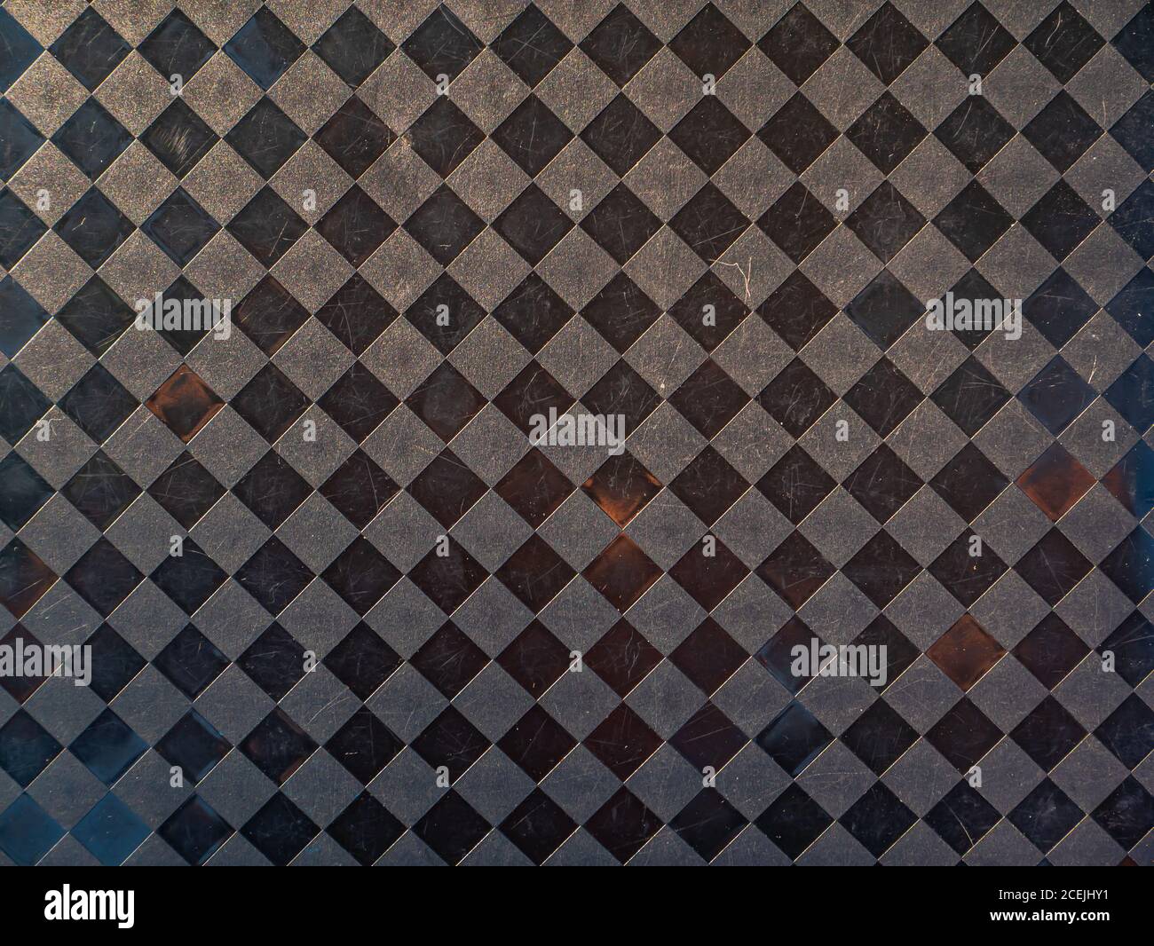 The texture of the plastic surface in black squares Stock Photo - Alamy