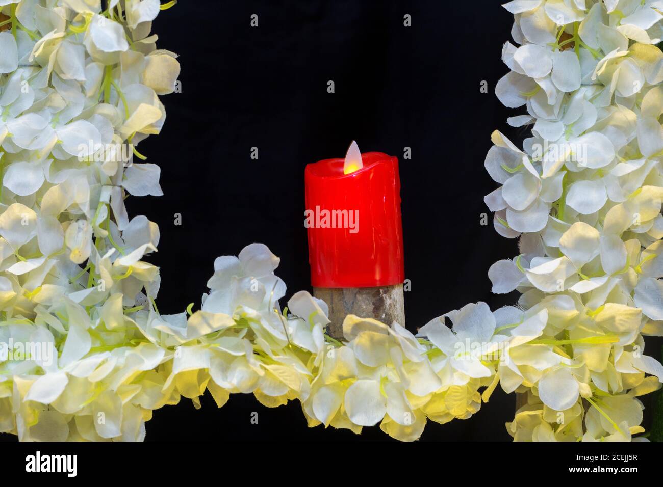 Wedding stage with artificial candles and flowers decoration Stock ...