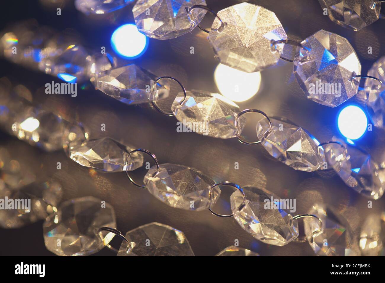 abstract background of crystal shiny stones in chains composed together ...