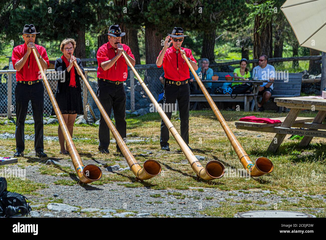 Alphorn players in Switzerland Stock Photo - Alamy