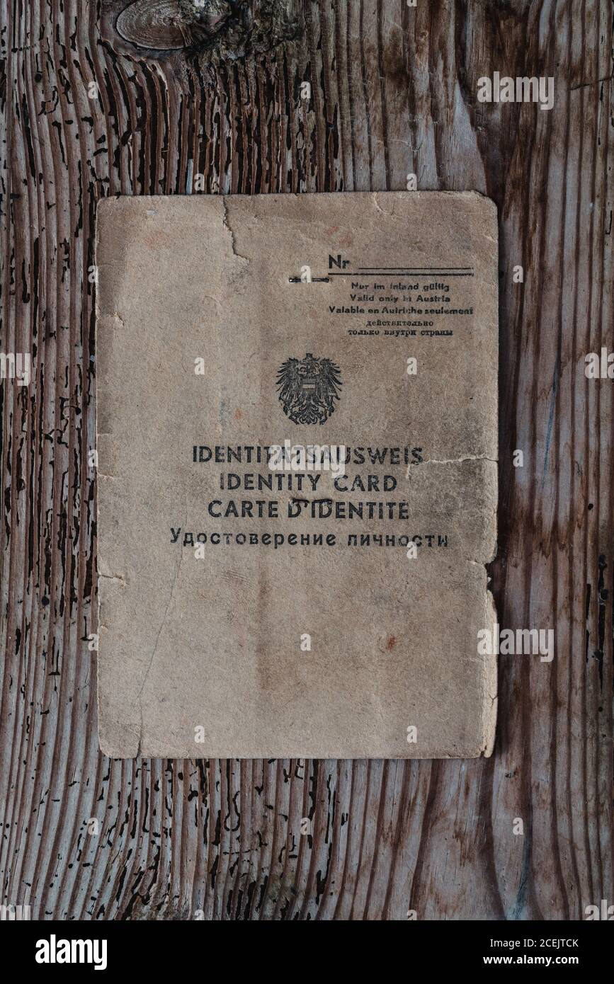 From above vintage identity card first page on wooden background Stock ...