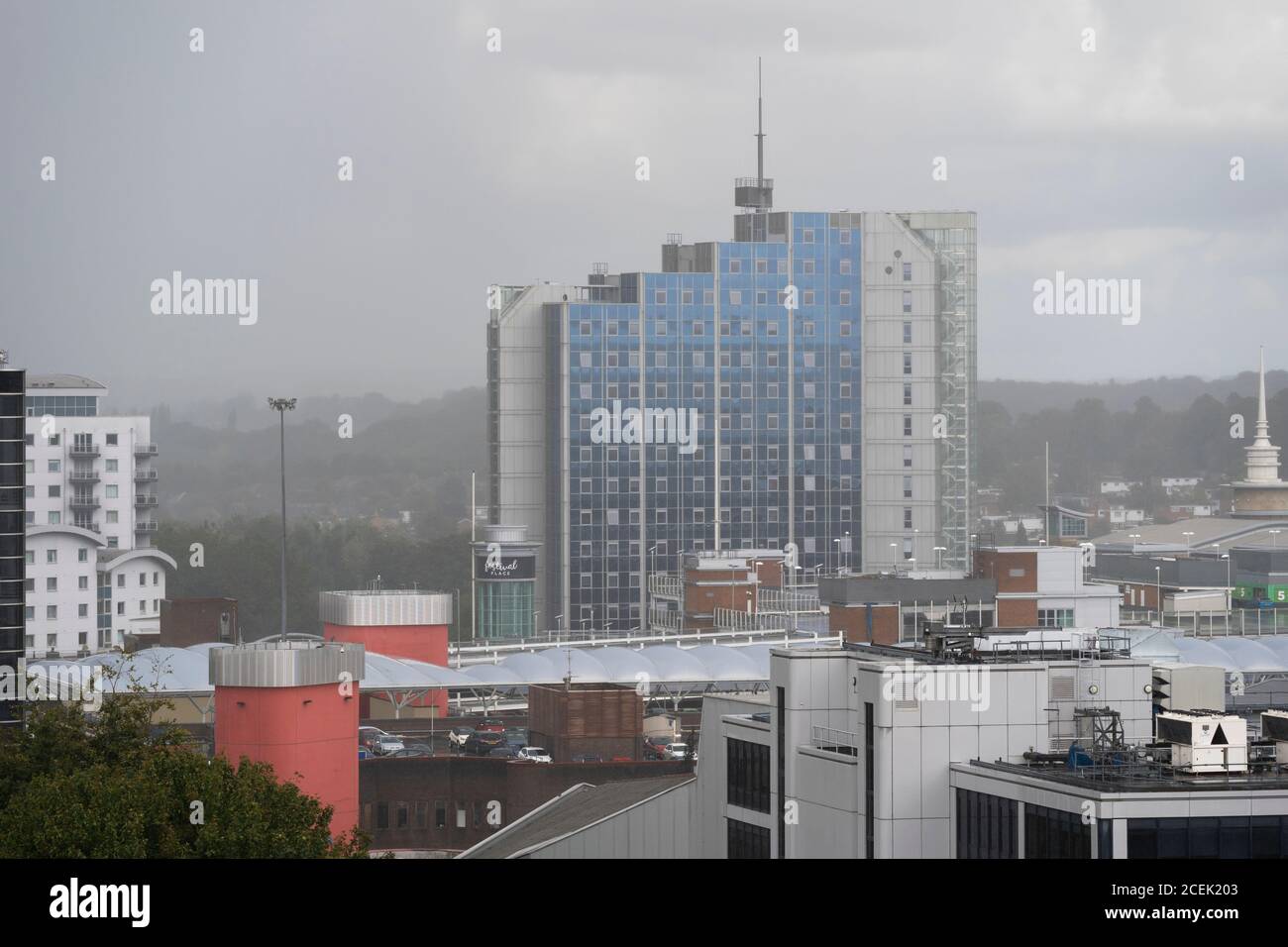 A moody aerial view of Churchill Place, a high rise apartment building ...
