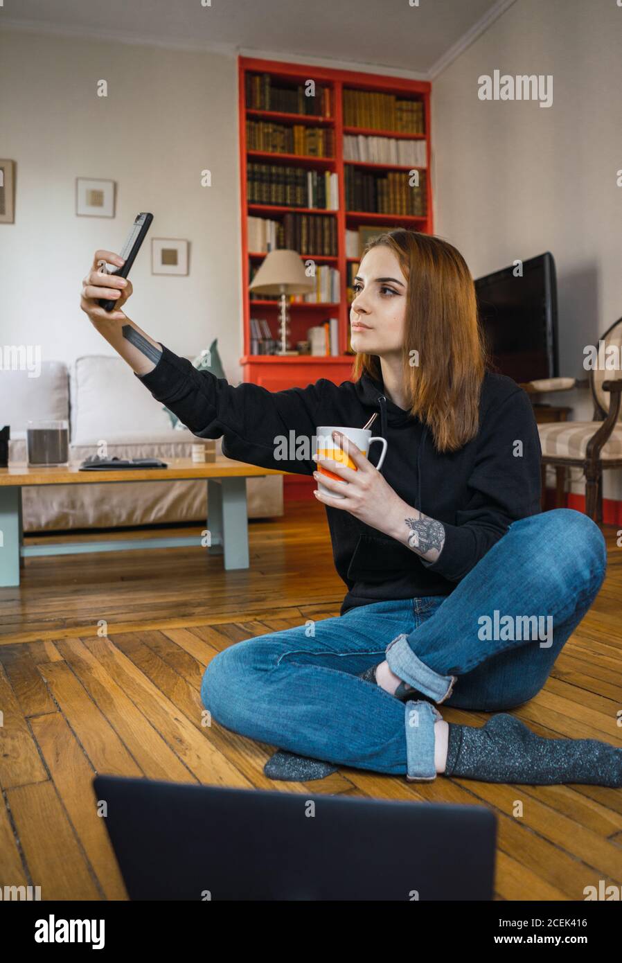 Woman taking selfie sitting hi-res stock photography and images - Alamy