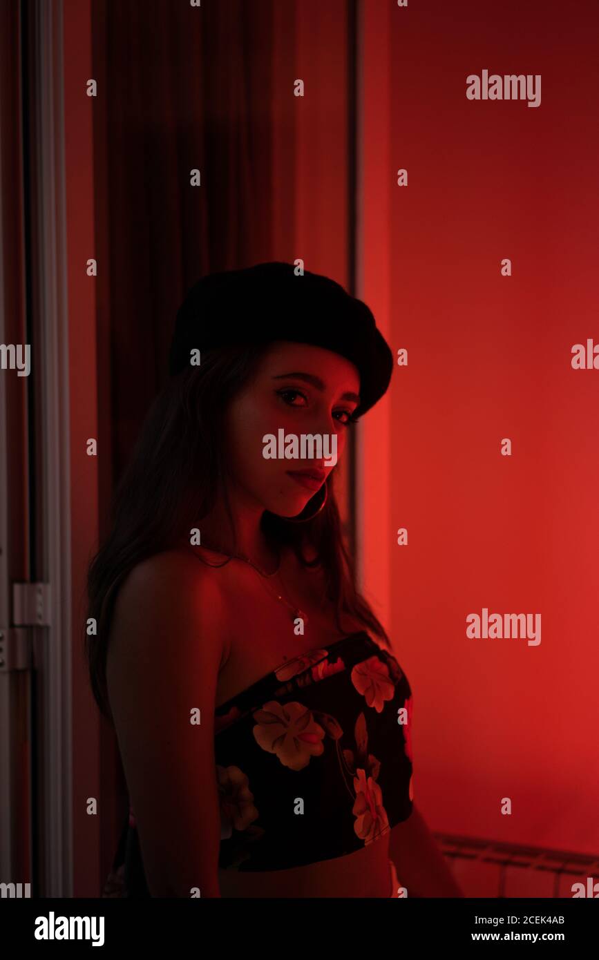 Side view passionate attractive brunette Woman?looking at camera in ...