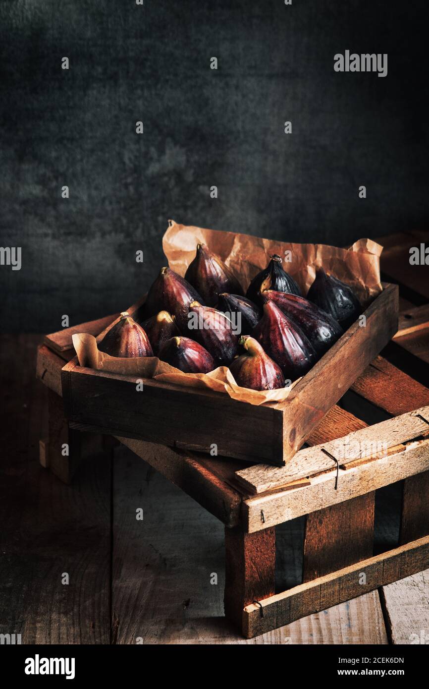 Healthy figs in a rustic box Stock Photo - Alamy