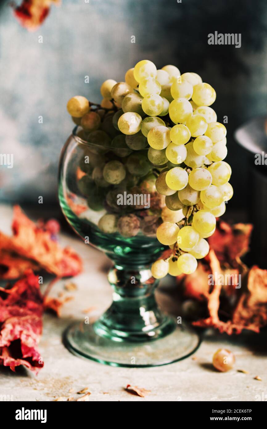 Grapes in a glass cup Stock Photo - Alamy