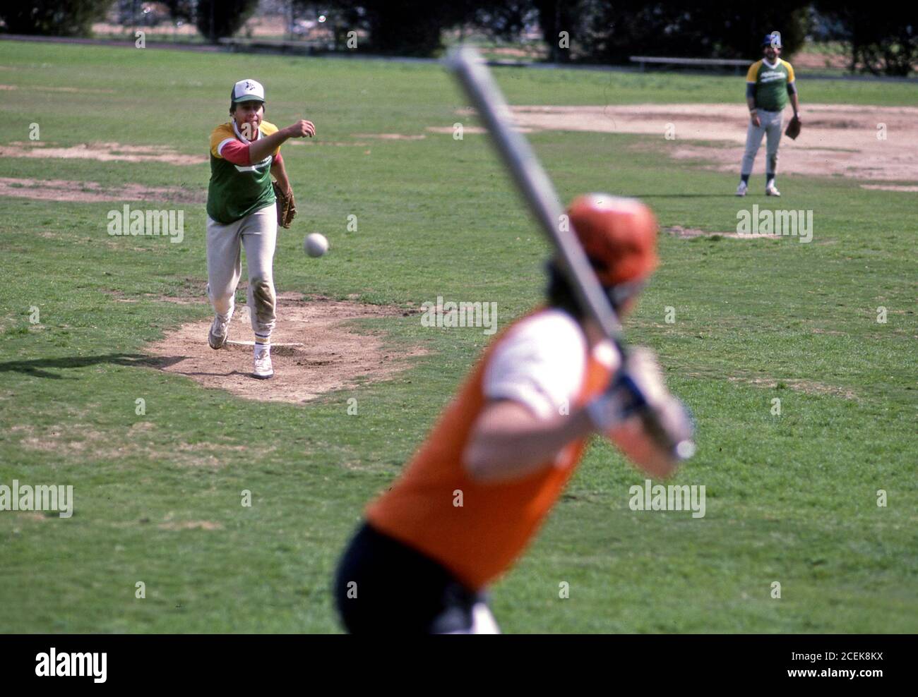 Brandon Tartikoff pitching in Saturday softball game circ a 1987 Stock ...