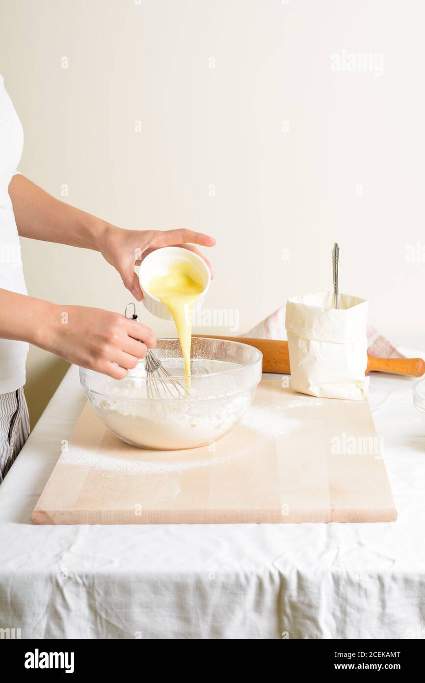 Cooking process woman pouring hi-res stock photography and images - Alamy