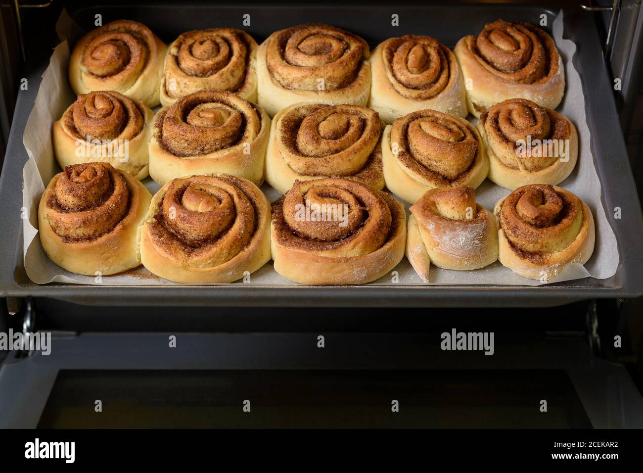 Buns on baking pan Stock Photo - Alamy