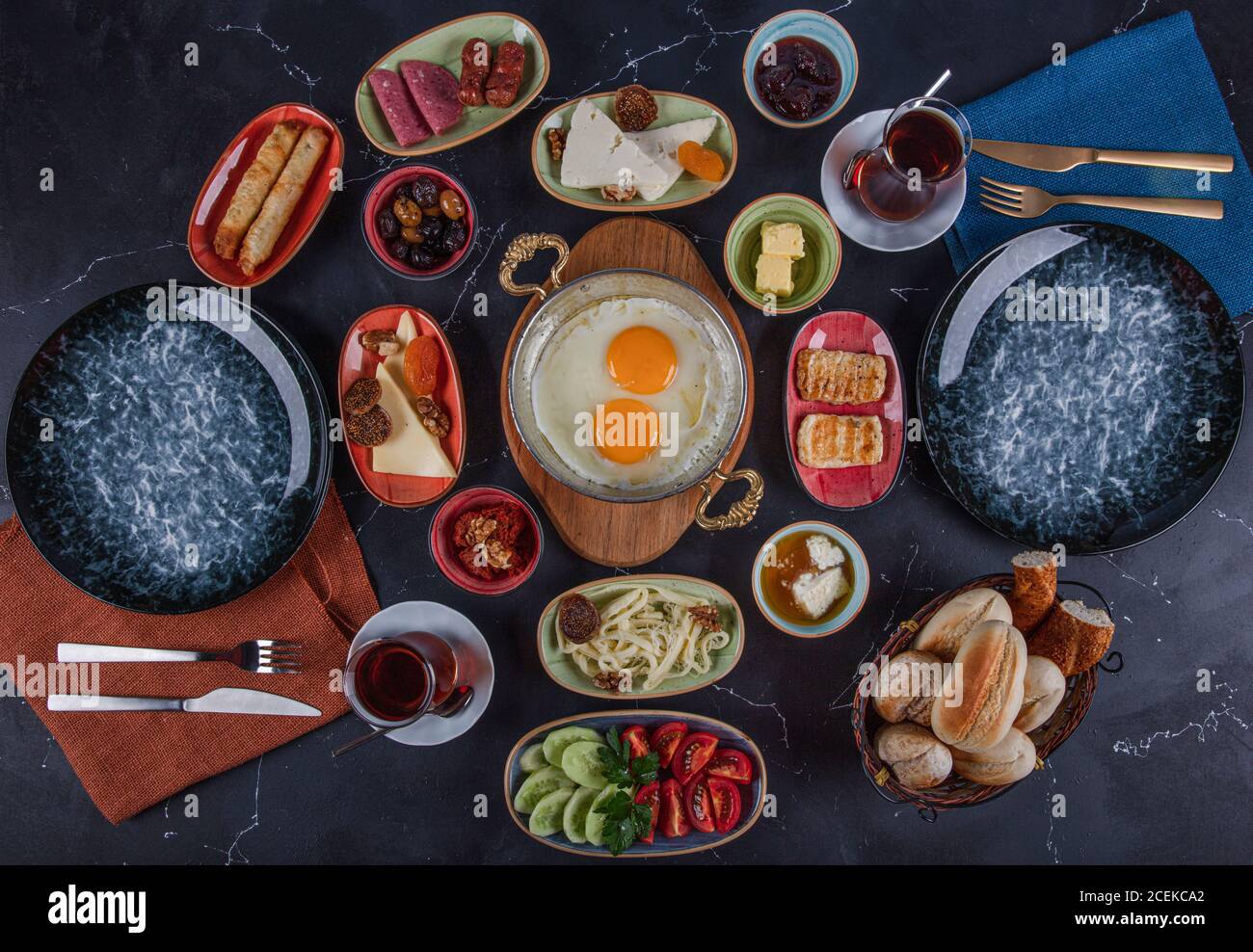 Restaurant concept; Traditional Turkish spreader breakfast on the black ...
