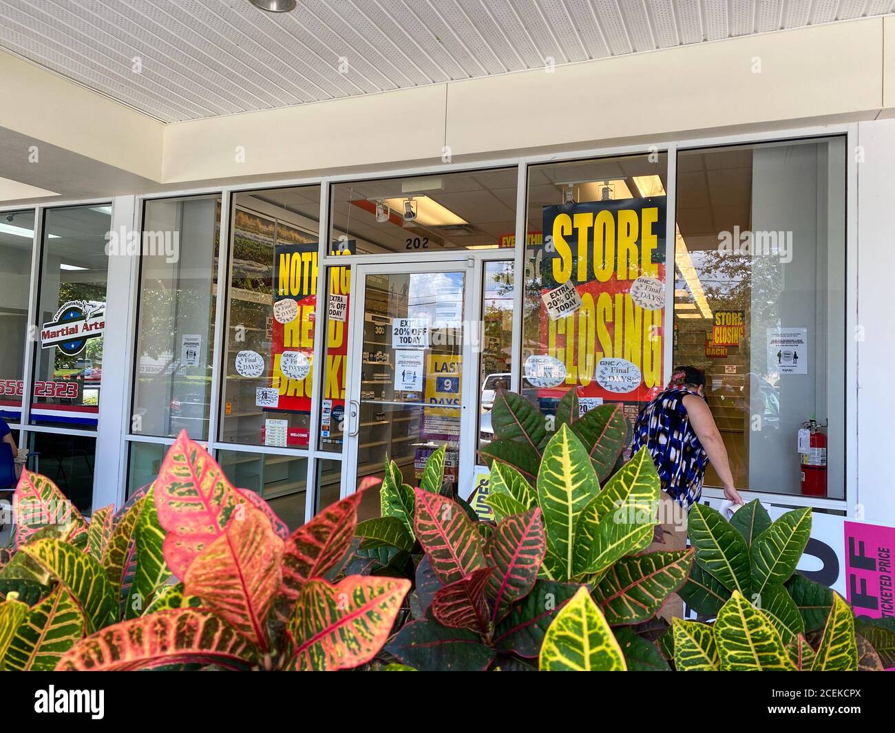 Orlando, FL/USA - 8/15/20: Store closing signs in a retail store in ...