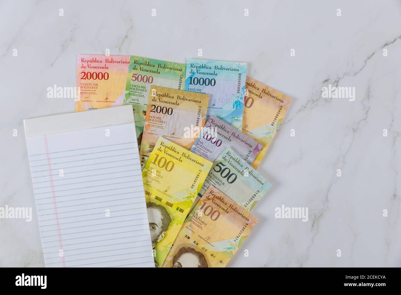 Office table with a series of banknotes with different paper bills ...
