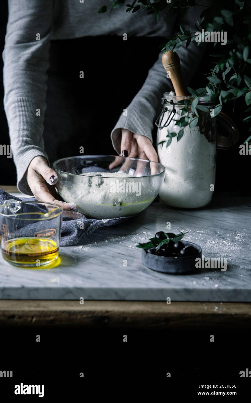 Crop person making cheese Stock Photo - Alamy