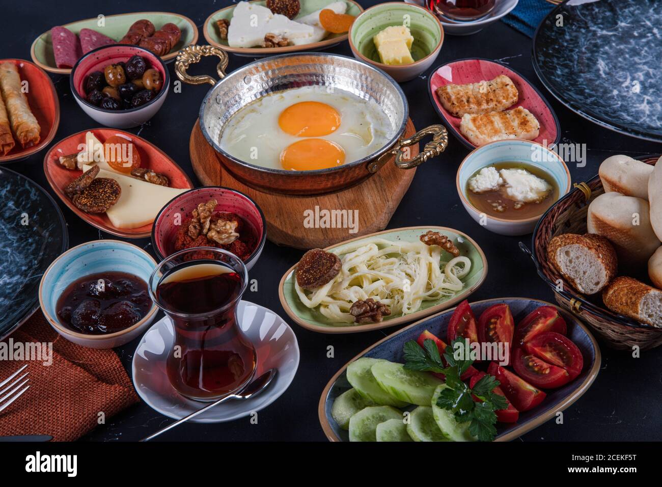 Restaurant concept; Traditional Turkish spreader breakfast on the black ...