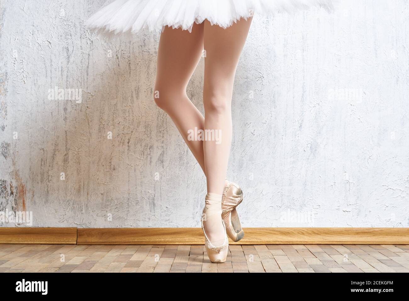 Legs ballerina pointe shoes white tutu performance Stock Photo - Alamy