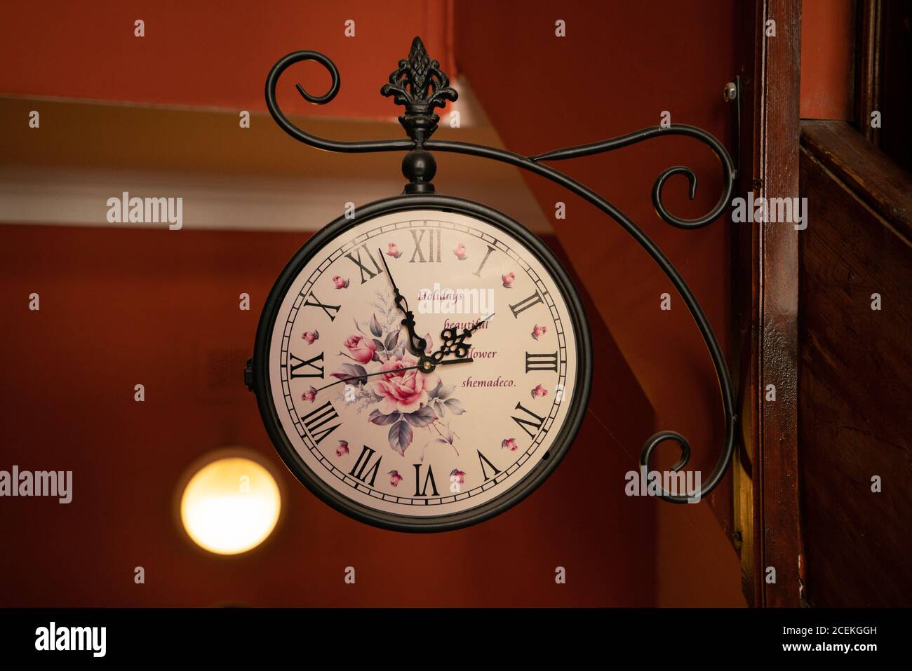 Retro Classic Old Wall Clock with Flowers Stock Photo - Alamy