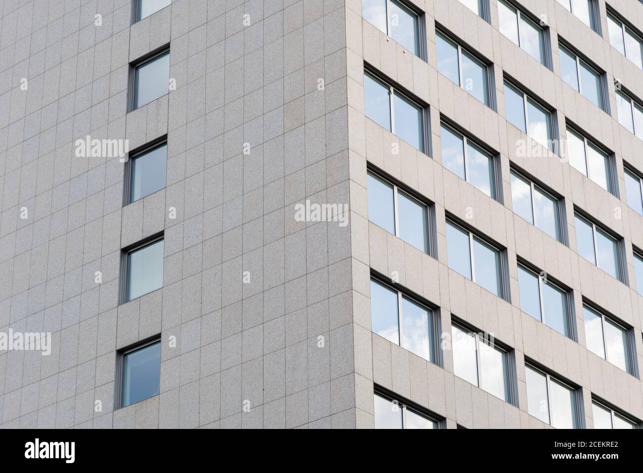 Close up detail at corner of white cladding facade with rectangular ...