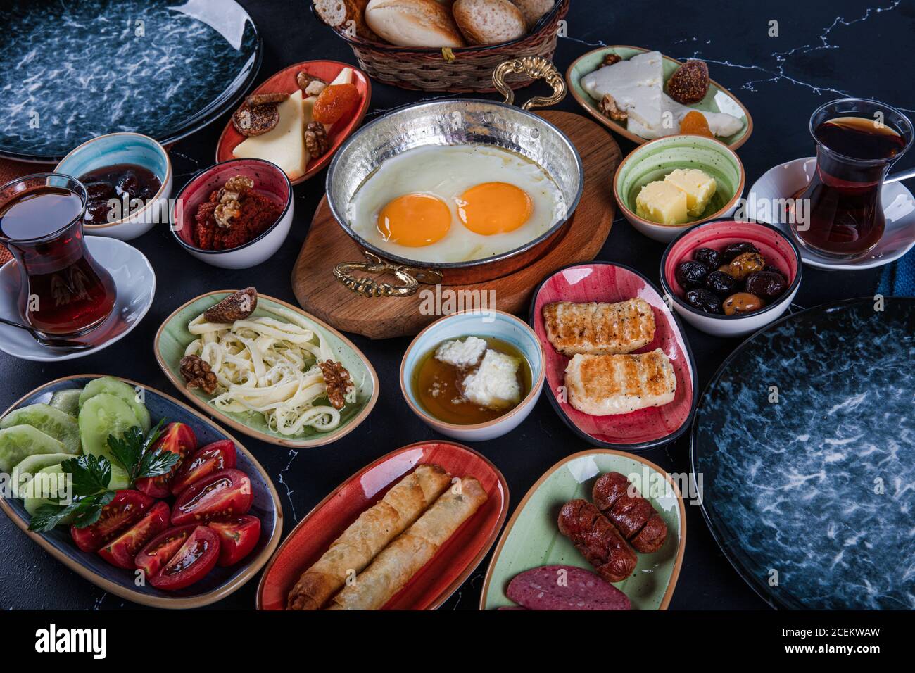 Restaurant concept; Traditional Turkish spreader breakfast on the black ...